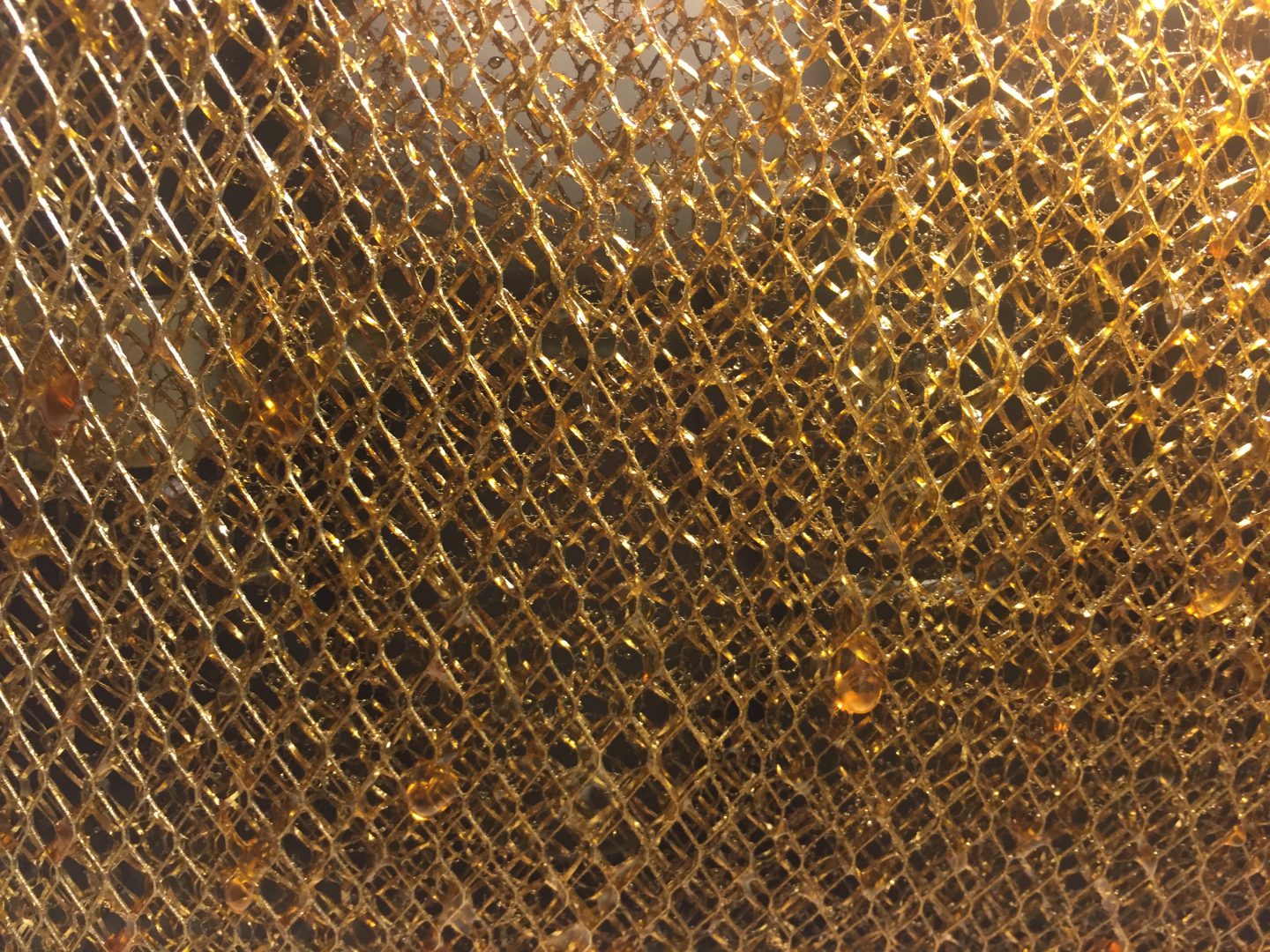 Layers of brass mesh with golden sap | Free Textures