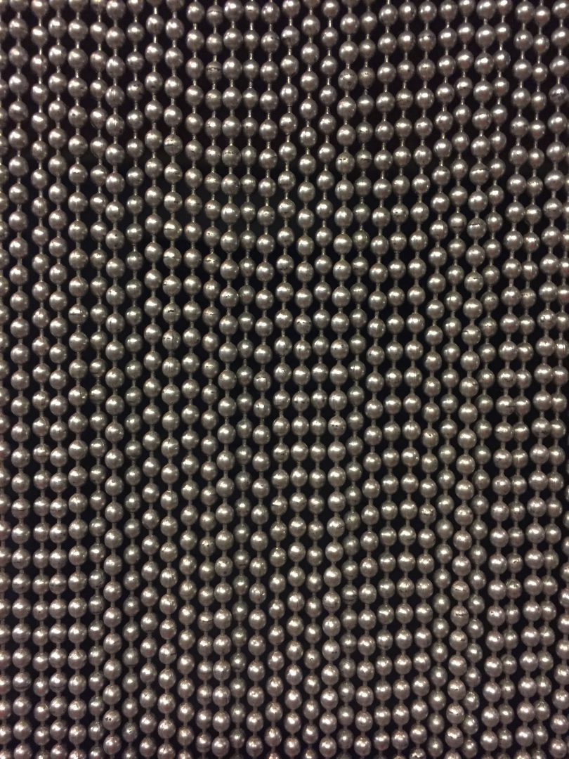 Strings of glossy beads black background | Free Textures