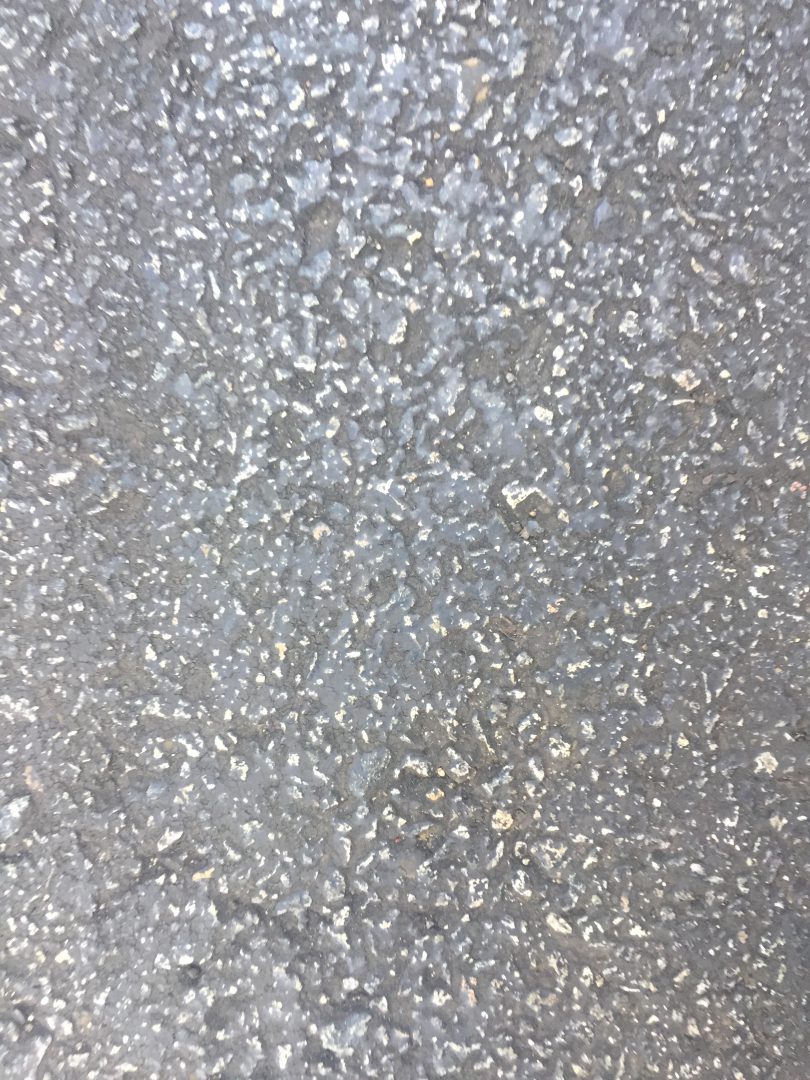 Rough blacktop close up with glossy spots | Free Textures