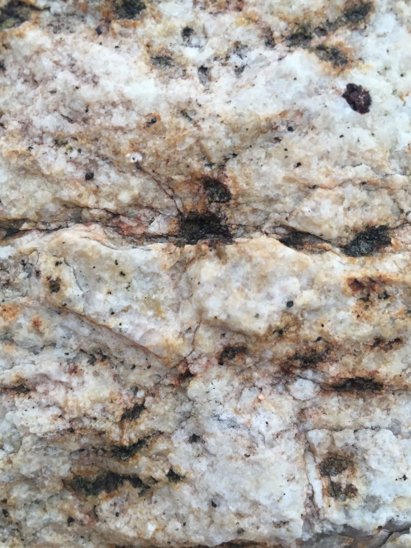 White rock with hints of color, black spots and cracks | Free Textures