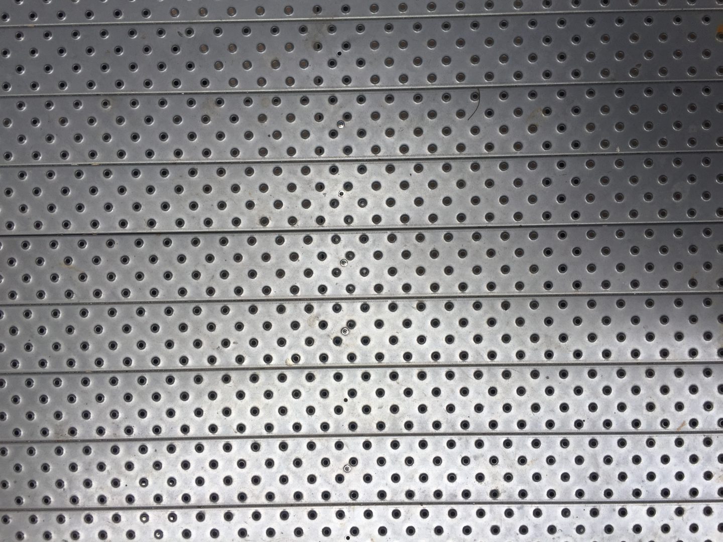 Punched sheet metal with horizontal lines | Free Textures