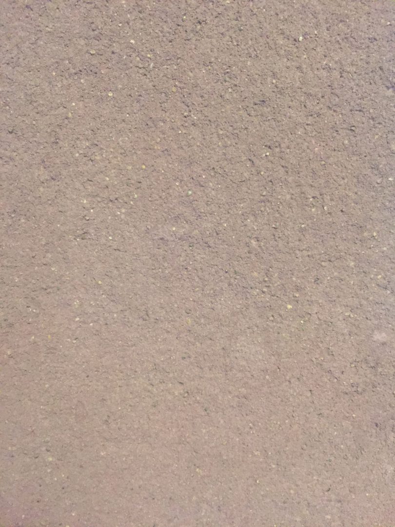Earth brown concrete like texture with small specs embedded | Free Textures