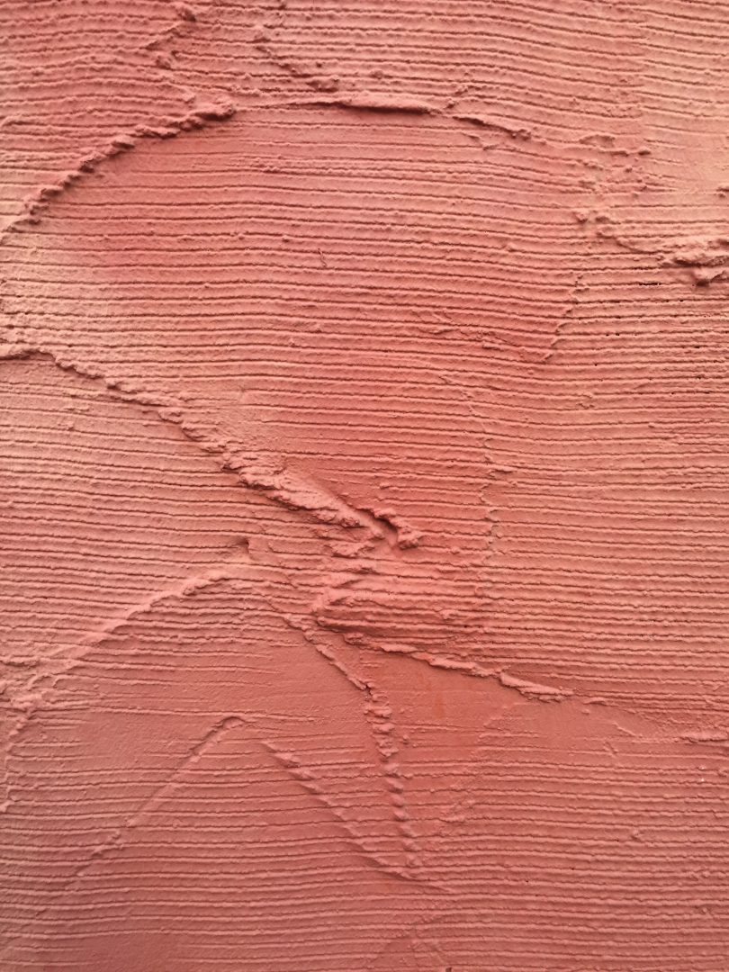 Dull red plaster wall with layers and lines | Free Textures